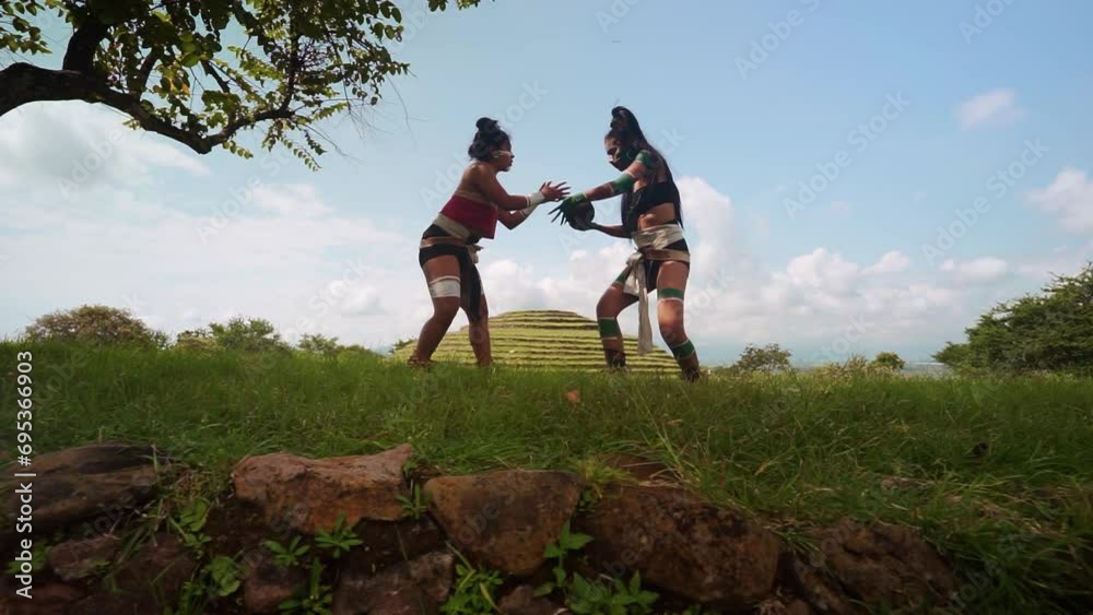 Mayan female warriors in traditional body costumes and face paint ...