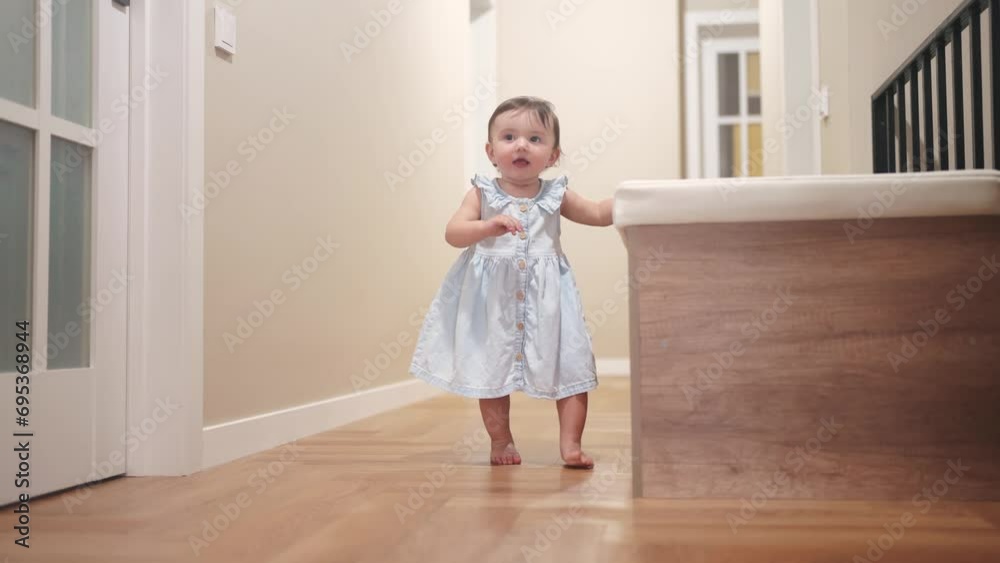 baby first steps. daughter a baby toddler learning to walk take first ...