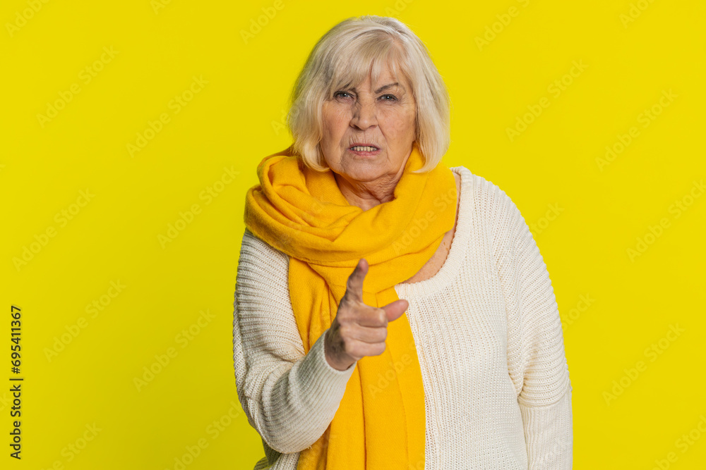 Quarrel. Displeased aggressive unhappy senior old woman gesturing hands ...