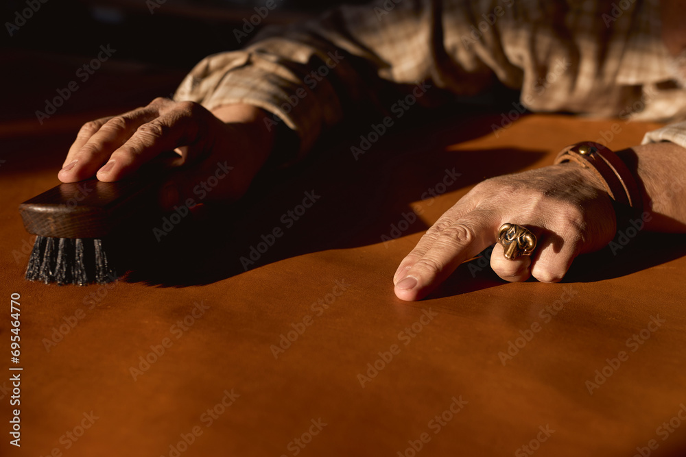 Cleaning and caring for leather. close up cropped photo. focus on ...