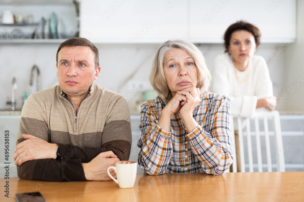 Family quarrel, all family members are upset, disappointed, keeping ...