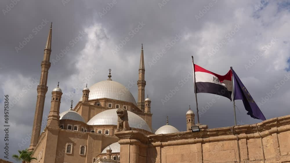 Cairo, Egypt: Egyptian national flag flying above the famous Muhammad ...