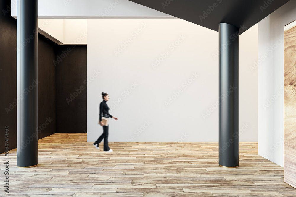 Side view of businessman walking in modern hallway interior with ...