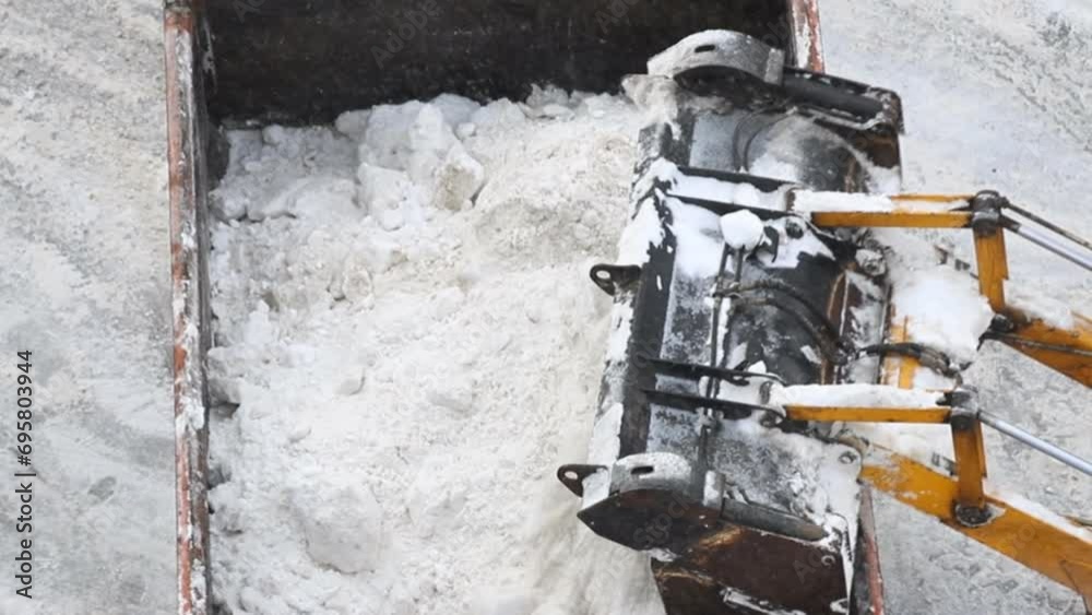 Close-up overhead above view of tractor loader machine snowplow shovel ...