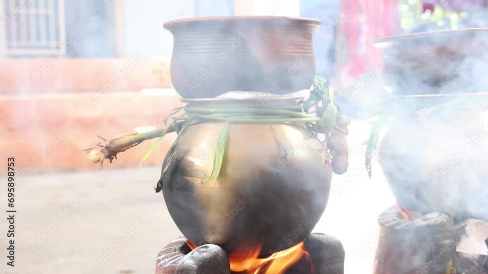 celebrating Traditional Thai Pongal festival to sun god with pot, lamp ...