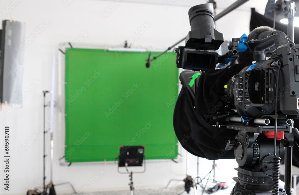 Setup in a TV studio with green screen, lights, and camera Stock Photo ...