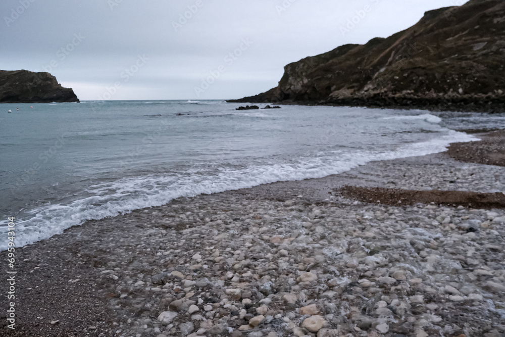 Lulworth Cove and beach view at winter day. Lulworth Cove bay, beach ...