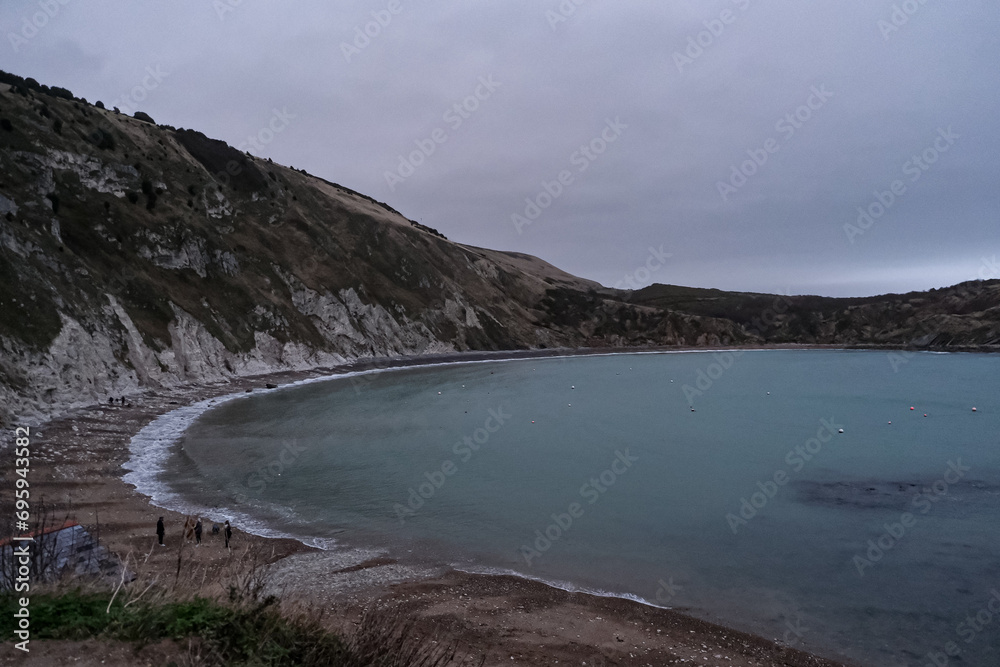 Lulworth Cove and beach view at winter day. Lulworth Cove bay, beach ...