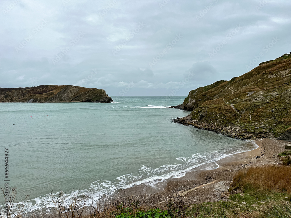 Lulworth Cove and beach view at winter day. Lulworth Cove bay, beach ...