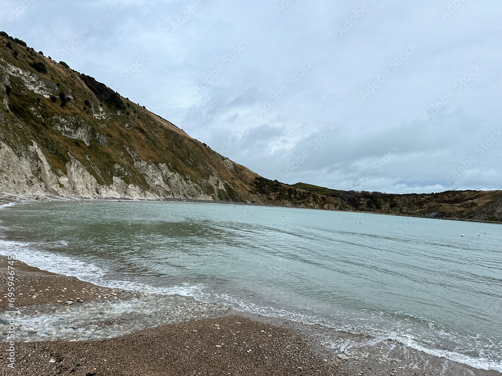 Lulworth Cove and beach view at winter day. Lulworth Cove bay, beach ...