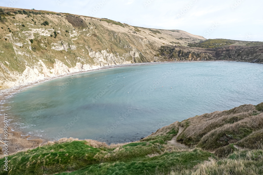 Lulworth Cove and beach view at winter day. Lulworth Cove bay, beach ...