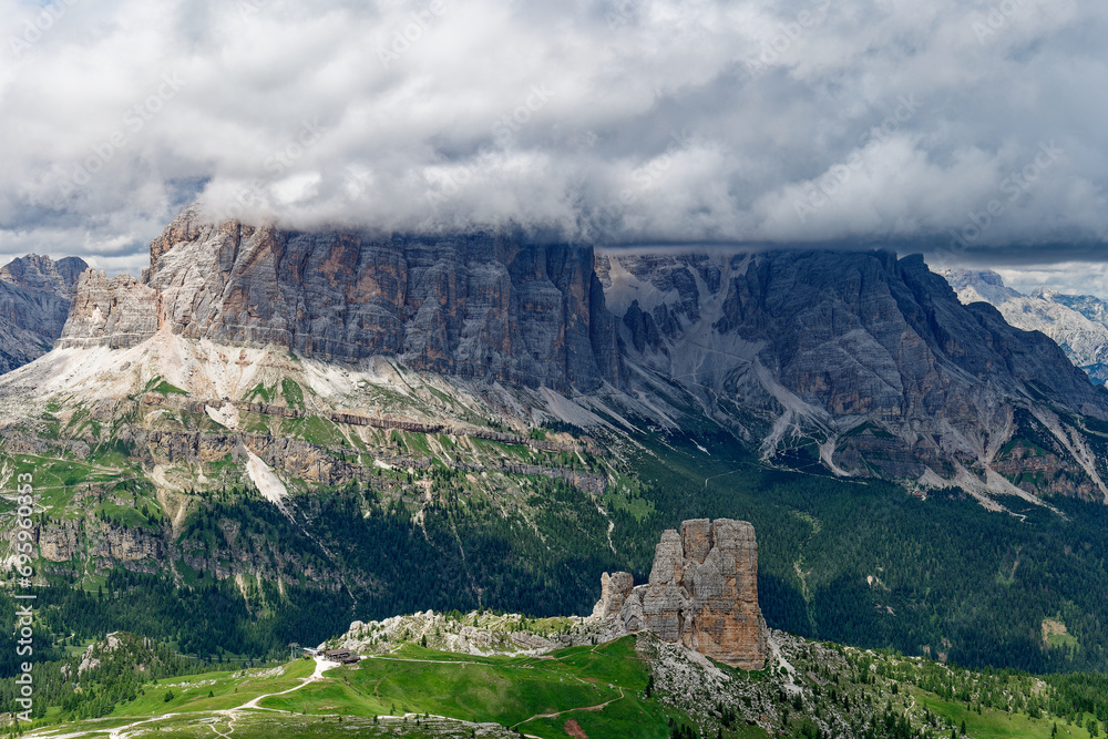 View of Cinque Torri with the Tofane mountain in the background covered ...