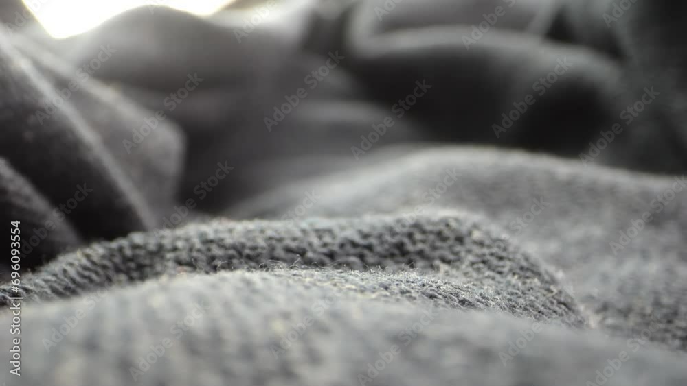 A close-up exploration of cloth, with the camera capturing every detail ...