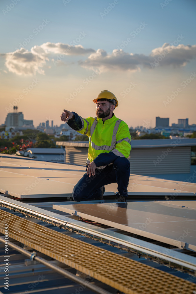 Engineer service check installation solar cell on the roof of factory ...