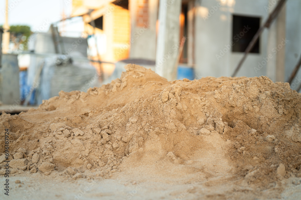 Pile of fine sand for building the house that stack on the ground with ...