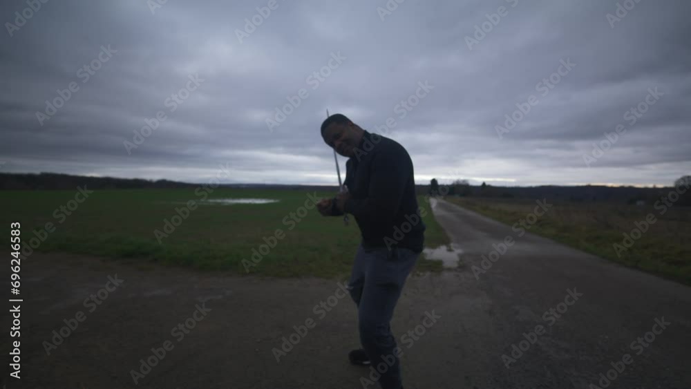 Modern Black Swordsman Warrior Awaiting Battle Opponent in Open Field ...