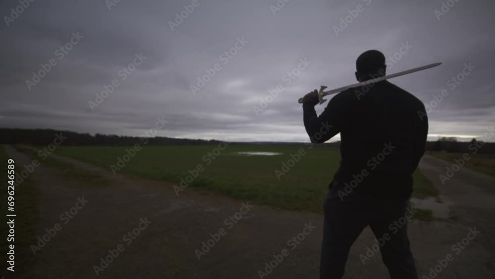 Modern Black Swordsman Warrior Awaiting Battle Opponent in Open Field ...