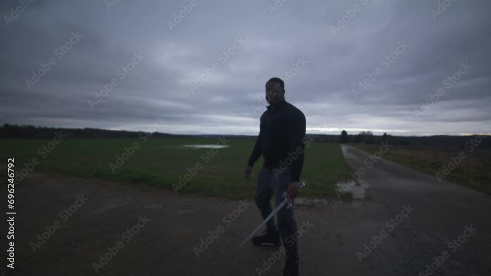 Modern Black Swordsman Warrior Awaiting Battle Opponent in Open Field ...