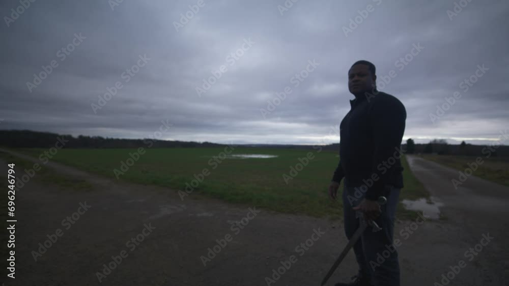 Modern Black Swordsman Warrior Awaiting Battle Opponent in Open Field ...