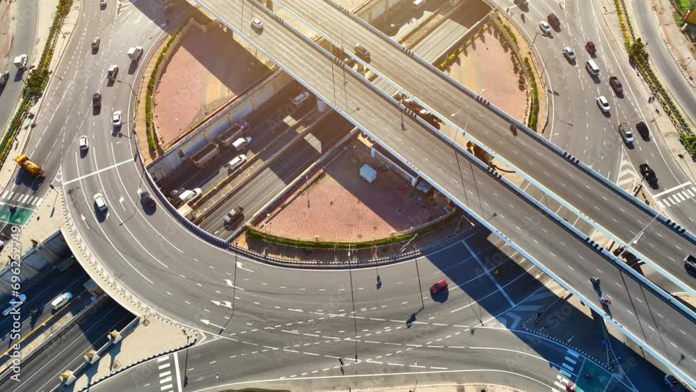 The interchange features a sleek roundabout seamlessly integrated with ...