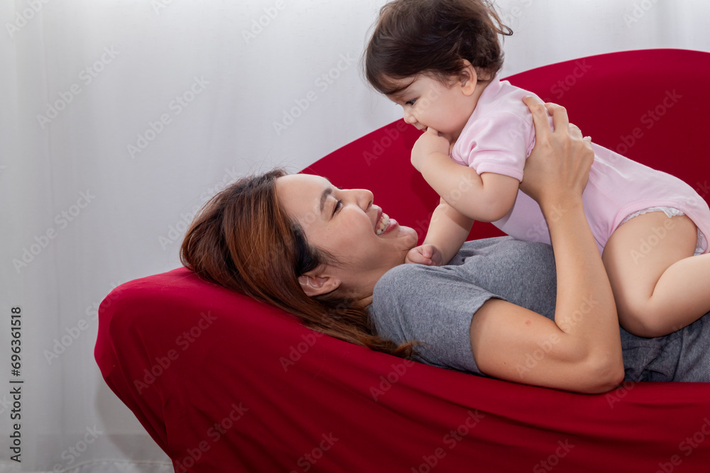 Close up Asian female relax and spend holiday time nurturing toddler ...