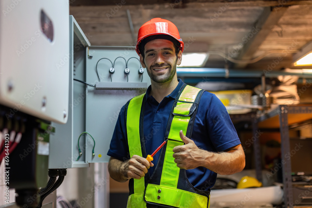 Electrical engineer working in control room. Electrical engineer man ...