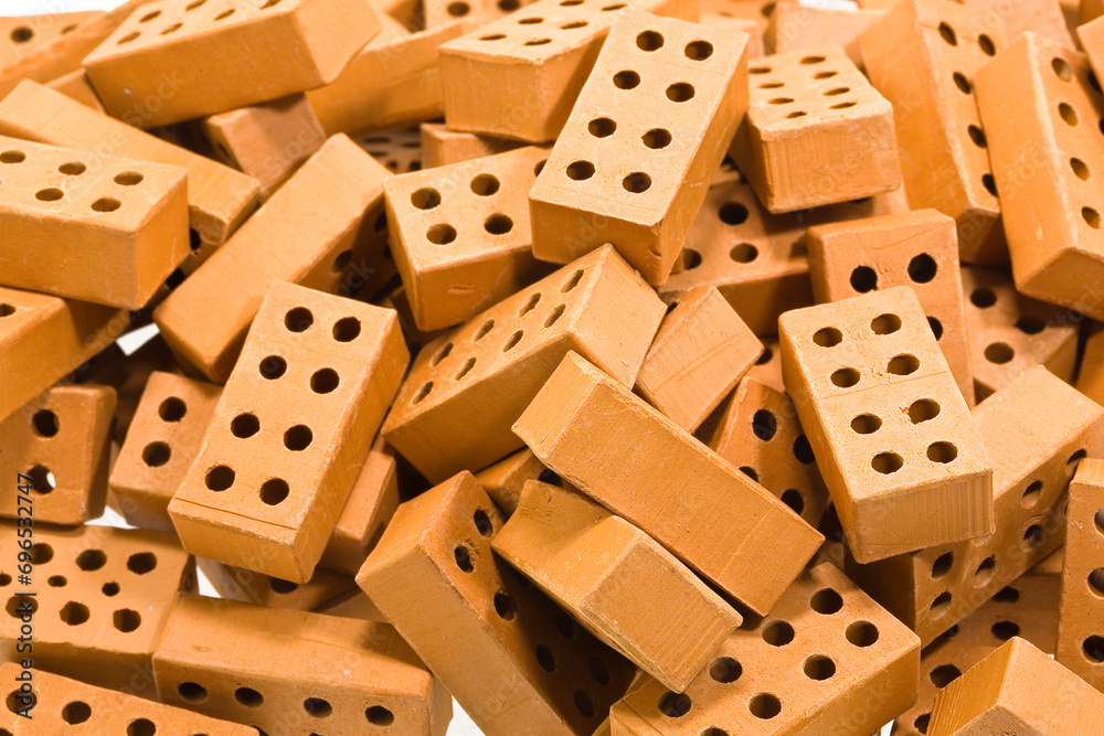 Pile of smal bricks model - construction site, building activity Stock ...