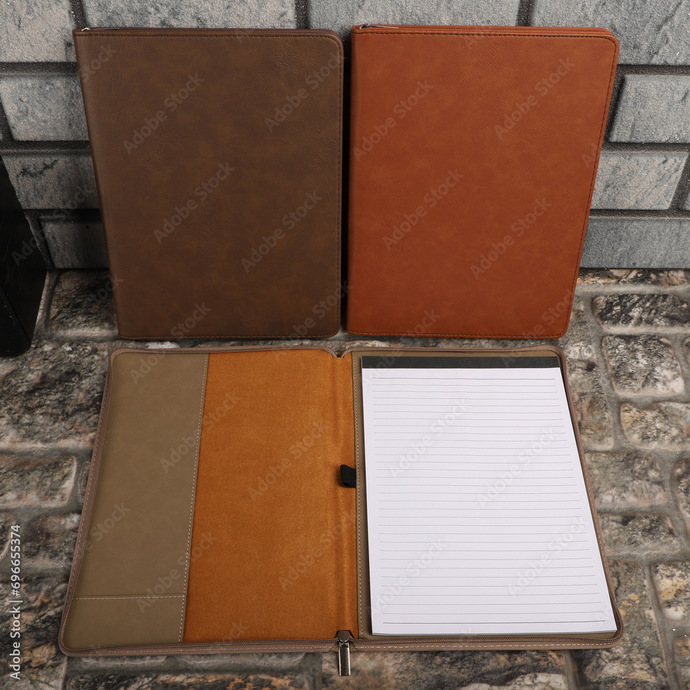 Leather Zipper Portfolio. Concept shot, top view, flap portfolio in ... Leather Zipper Portfolio. Concept shot, top view, flap portfolio in ...