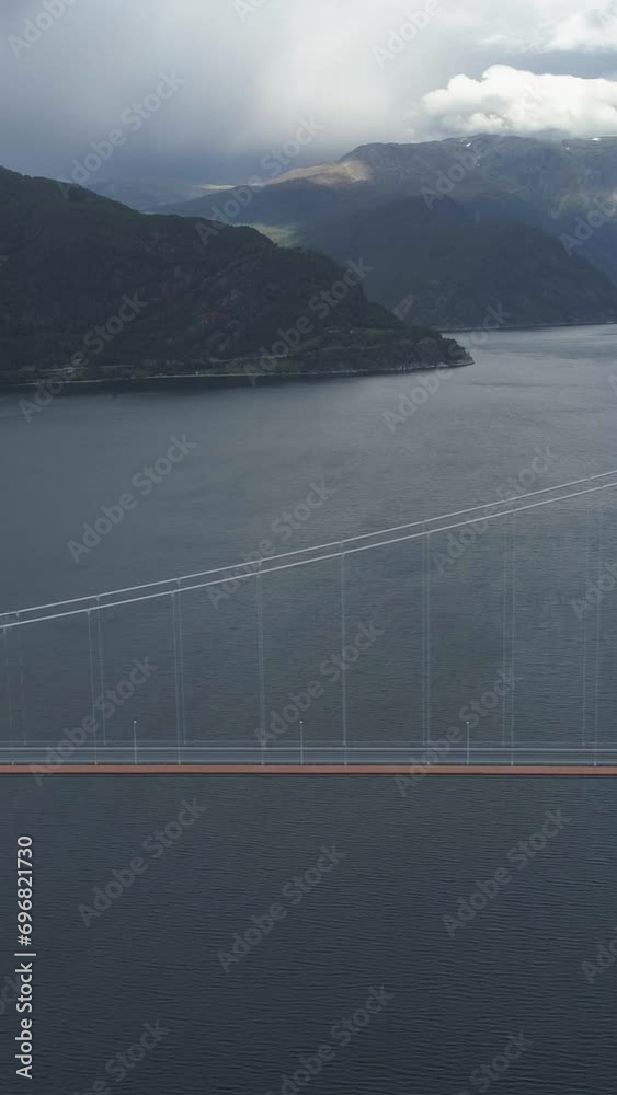 Tall Hardanger Suspension Bridge across the Hardangerfjord with Passing ...