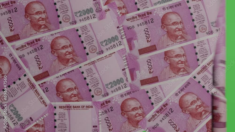 Indian rupee banknotes spread out unrolling and rolling back 4k. Green ...