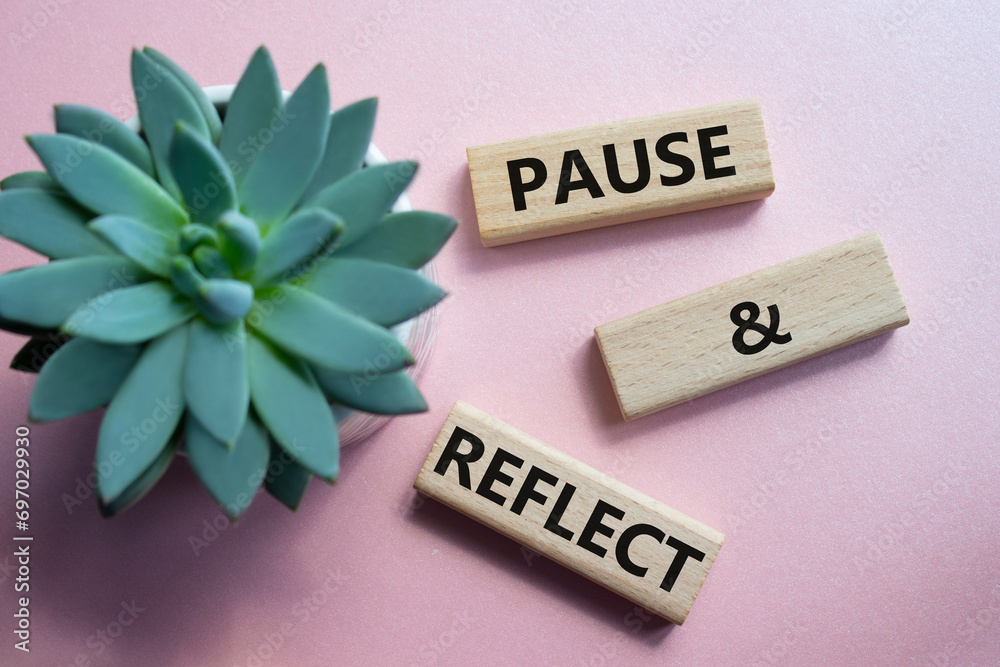 Pause and Reflect symbol. Concept words Pause and Reflect on wooden ...