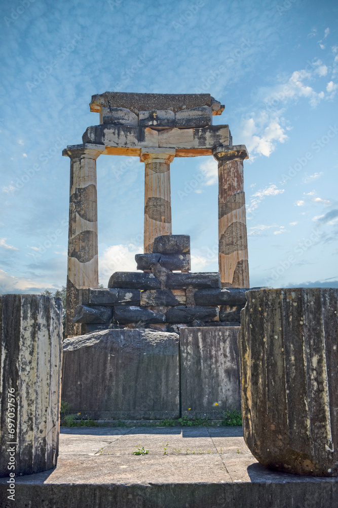 panoramic view to the Tholos of Delphi, a circular temple and one of ...