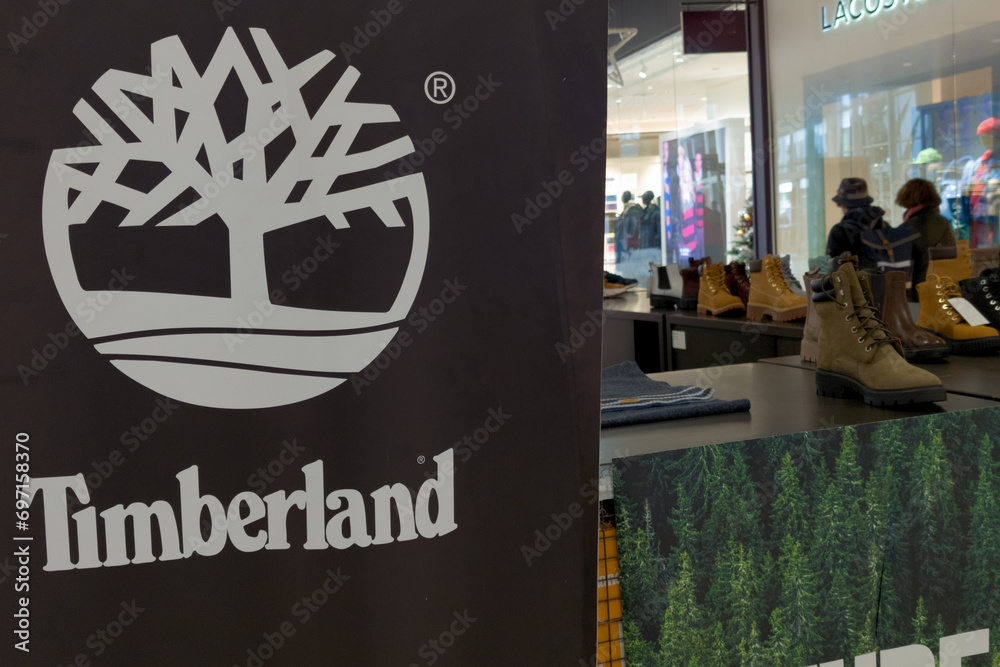 timberland boutique brand logo and sign text shop on signboard facade ...