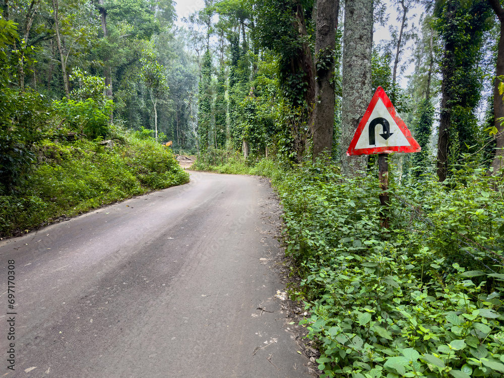 Road cautionary sign indicating right reverse bend ahead. Sign ...