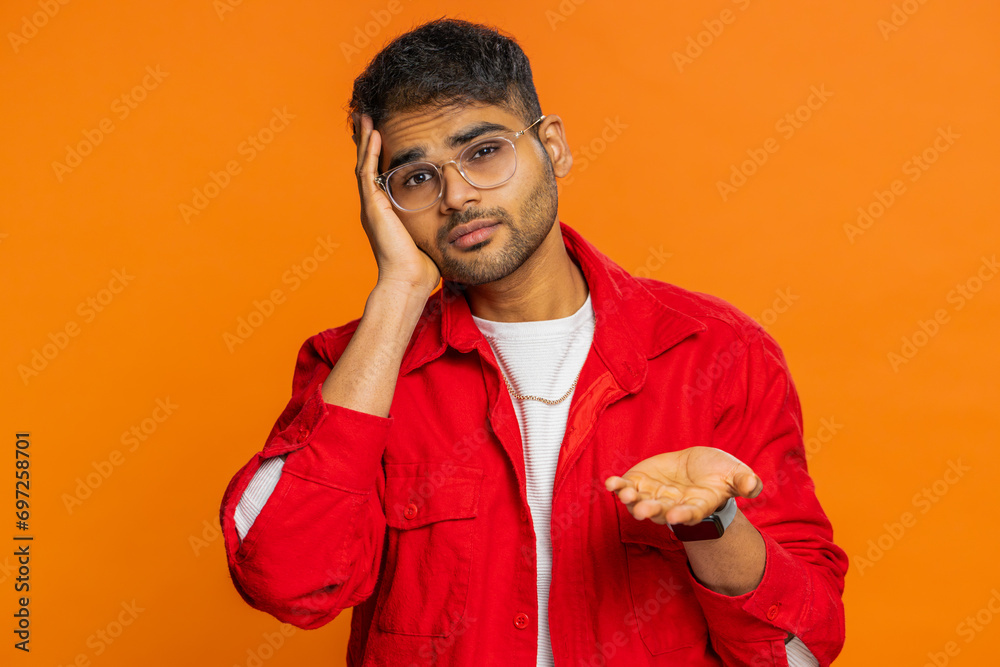 Sad young Indian man feeling hopelessness loneliness, nervous breakdown ...