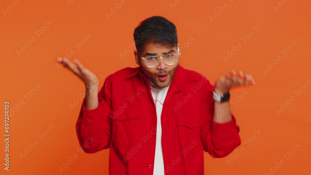 What. Why. Angry Indian man raising hands in indignant expression ...