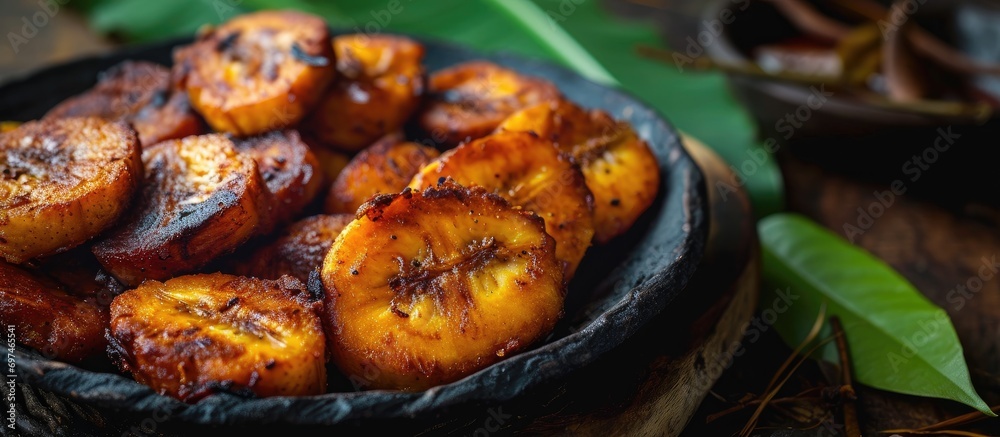 Top view of fried bananas, a sweet snack in Kerala known as pazham pori ...