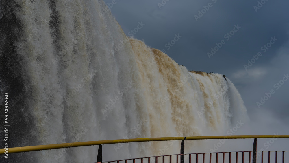 Powerful streams of the waterfall. Close-up. White foaming water ...