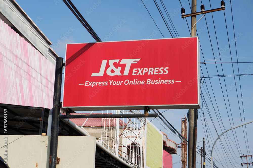 JNT billboard for goods delivery expedition. Bontang, East Kalimantan ...