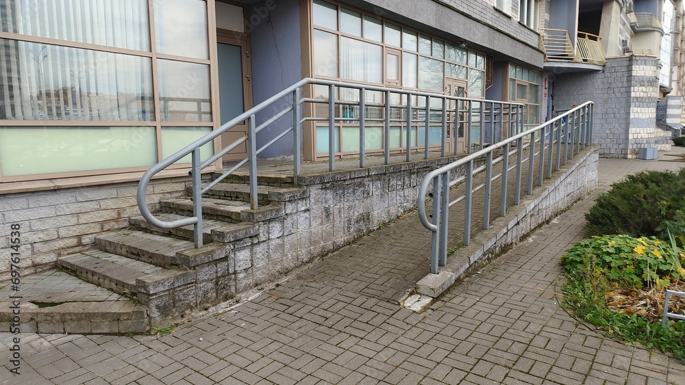 Photo & Art Print A sloping tile ramp with metal railings was made for ...