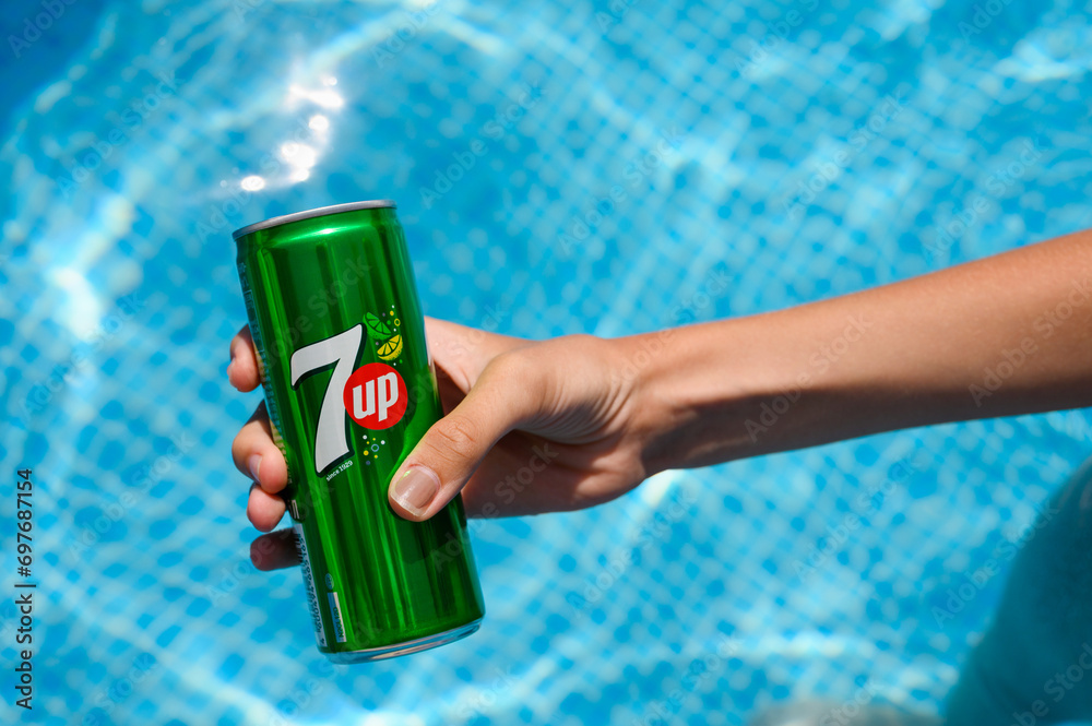Anapa, Russia - July 18, 2023: A can of 7up lemonade in a hand against ...
