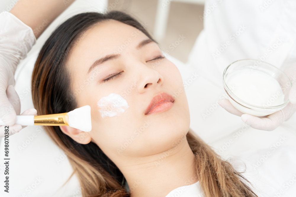 Beautiful woman receive spa and treatment skin of face. face of a ...