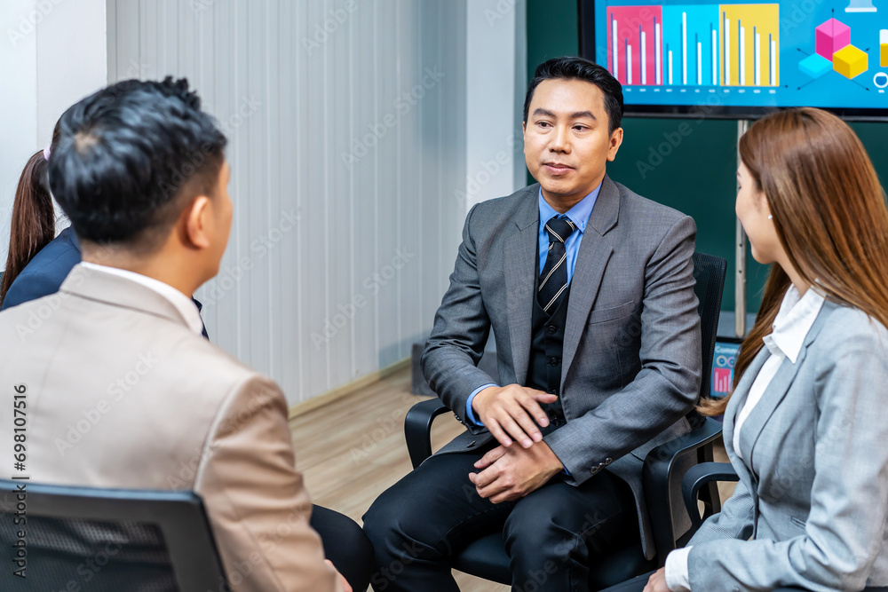 Happy group leader asian man speaking on team building meeting ...