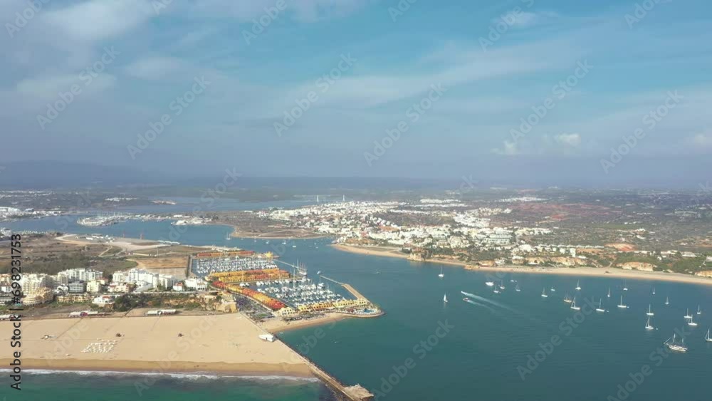 Vidéo Stock Cinematic aerial perspective of Portimao Marina. Luxury ...