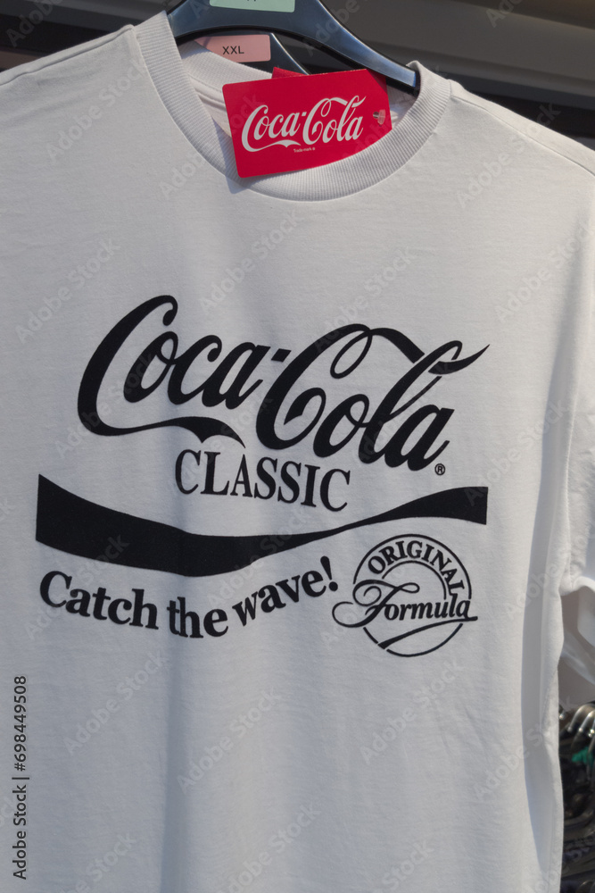 Coca Cola classic drink sign brand and text logo on advertising shirt ...
