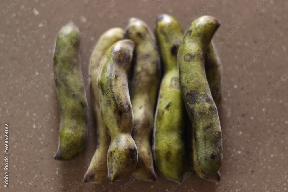 Bunch of Kewach or kenwach bean or thick french beans lying on the ...