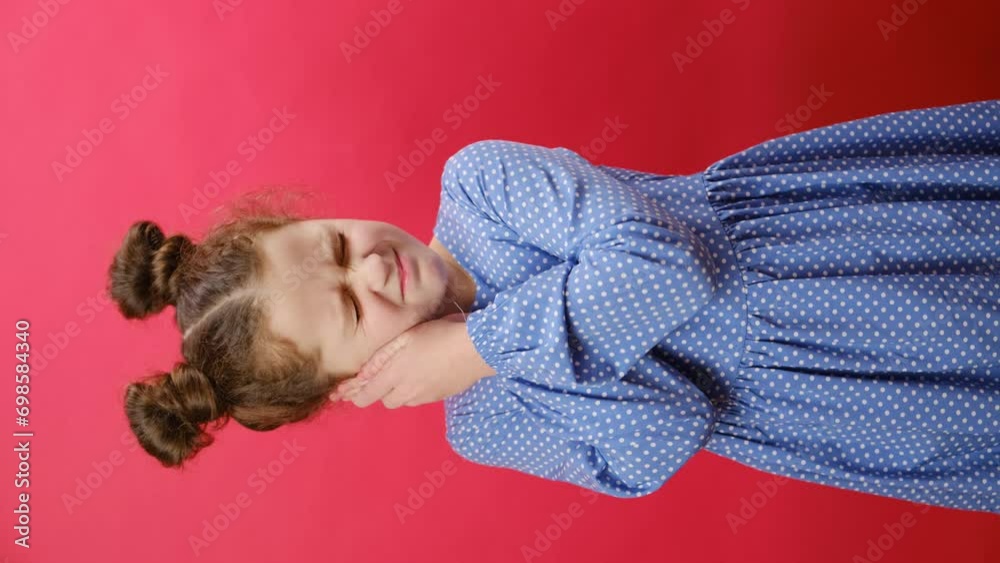 Vertical footage of unhappy little girl child suffering from ear pain ...