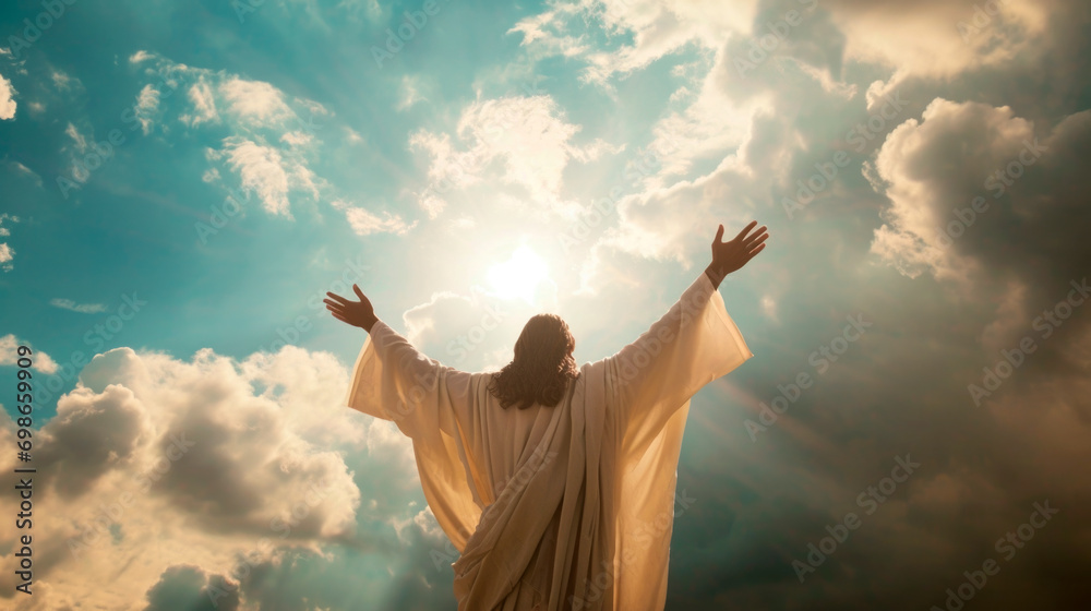 Foto de rear view Jesus Christ with open arms against blue sky do Stock ...