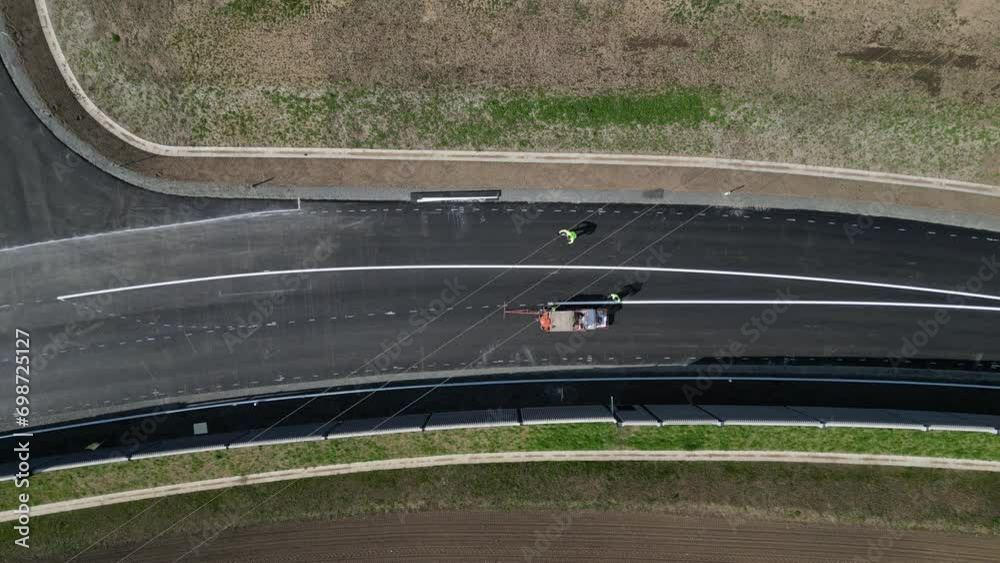 we perform horizontal road markings: central dividing lines, guide ...