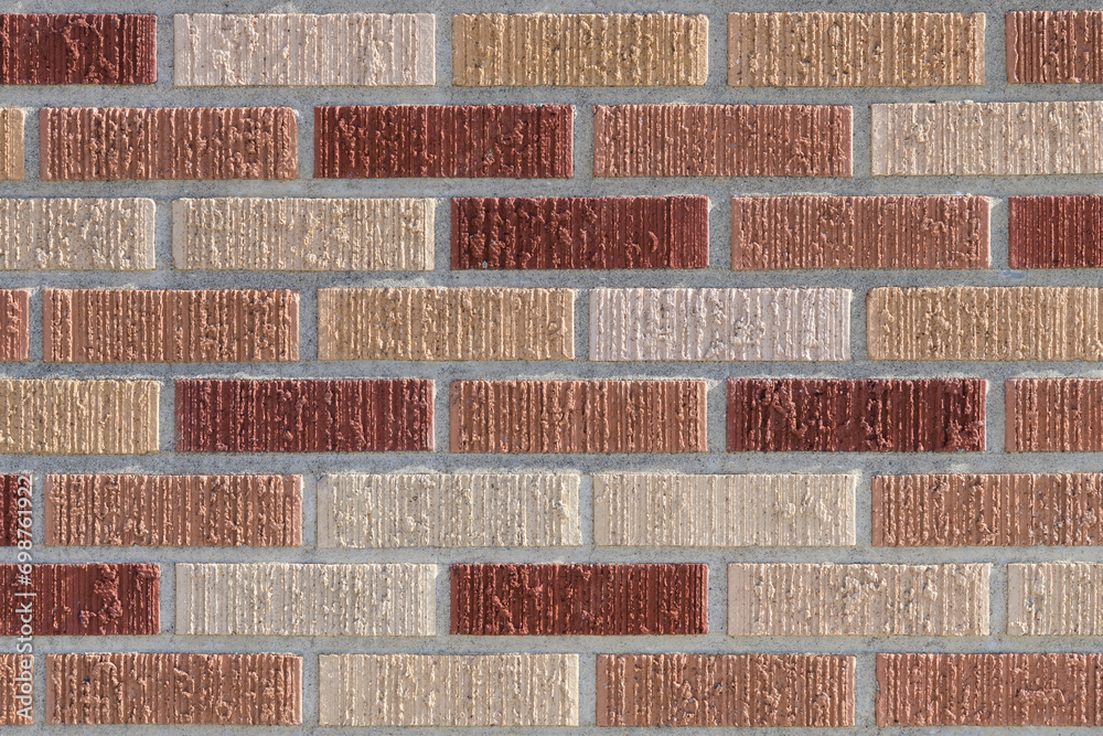 Modern wall of thin red bricks with vertical texture in closeup Stock ...